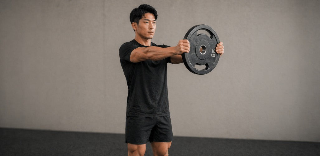 Plate Front Raise: Form, Muscles Worked, Variations & How to Train Sho ...